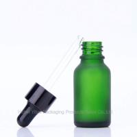 China Refillable Frosted Green Glass Dropper Bottles 10ml to 100ml with UV Protection and Custom Logo Options for sale