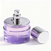 China Purple Custom 100ml Glass Perfume Bottles with 5cm Width 7cm Height Dimensions - Blow Molding Manufacturing for sale