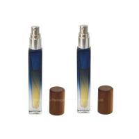 China 10ml Blue Glass Cosmetic Spray Bottle with Wooden Cap - Premium Travel Size Packaging for sale