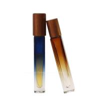 China 10ml Blue Glass Cosmetic Spray Bottle with Wooden Cap - Premium Travel Size Packaging for sale