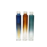 China 10ml Blue Glass Cosmetic Spray Bottle with Wooden Cap - Premium Travel Size Packaging for sale