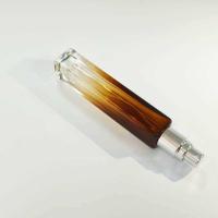 China 10ml Blue Glass Cosmetic Spray Bottle with Wooden Cap - Premium Travel Size Packaging for sale