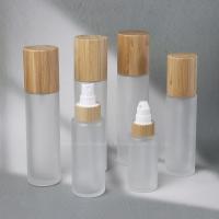 China Custom Logo Attar Atomizer Spray Bottle 60ml 100ml Plastic with Wooden Cap for Cosmetics and Personal Care for sale