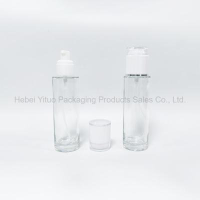 China Clear Empty Lotion Bottle 30ml Frosted Glass with Gold Pump for sale