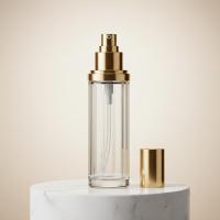 China Empty Lotion Bottle Luxury 1oz Glass Frosted with Gold Pump 60ml 100ml for sale