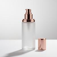 China Empty Lotion Bottle Luxury 1oz Glass Frosted with Gold Pump 60ml 100ml for sale