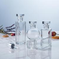 China Bulk Glass Perfume Bottles 10ml 20ml 50ml Round Clear Empty for Essential Oils Fragrances for sale