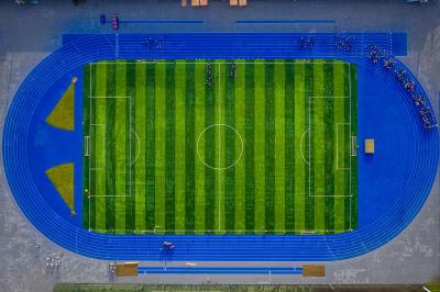 China Blue Synthetic Tartan Running Track 13mm Thickness Sandwich Playground Flooring IAAF Certified for sale