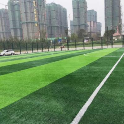 China 16800 Needle No Infill Artificial Football Grass 35mm Pile Height PP PE Yarn Fadeless Turf for sale