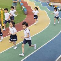China Corrosion Resistance Interlocking Rubber Playground Tiles Stadium Rubber Running Track for sale