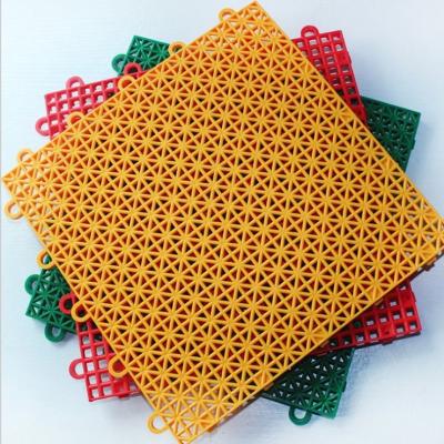 China Suspended PP Interlocking Sports Flooring 250x250x12.7mm Green Futsal Court Plastic Flooring for sale