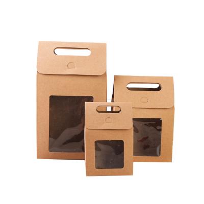China Eco Friendly Kraft Paper Bags Shopping Clothing Carrier Custom Logo for sale