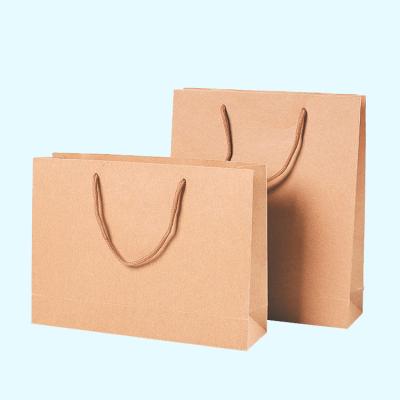 China manufactures custom brown paper bags with your own logo packaging customized retail luxury shopping bag gift for clothing for sale