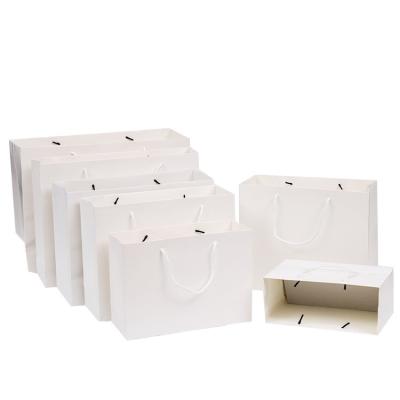 China Manufacturer Made cheap shopping Kraft Window Gift Paper Bag With Logo for sale