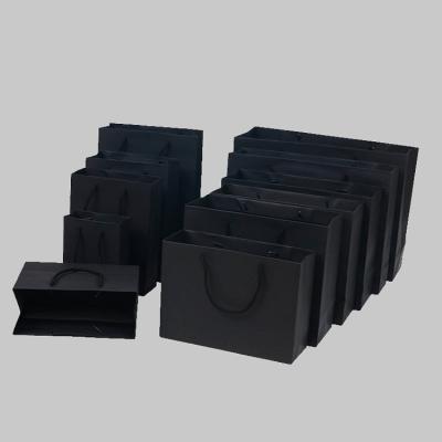 China Free Sample Wholesale Gift Packaging Custom Shopping With Your Own Logo White Black Brown Kraft Paper Bag for sale