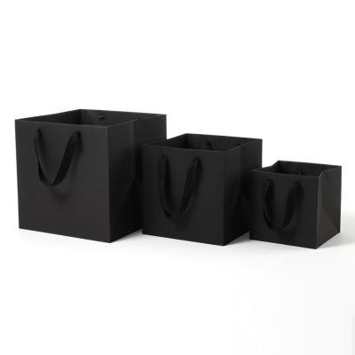 China Packaging Printed Packing Printing With Handle Luxury Shopping Gift Paper Bag With Own Logo For Clothes Shoes for sale