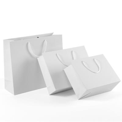 China Wholesale Price Gift Paper Bag With Handle Custom Logo Kraft Party Shopping Colorful Paper Gift Bag With Handle for sale