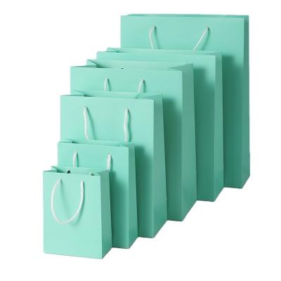 China Hot Selling Custom Logo Printing Recycle Gift Printed Shopping Paper Bag With Ribbon Handle Packaging Paper Bags for sale