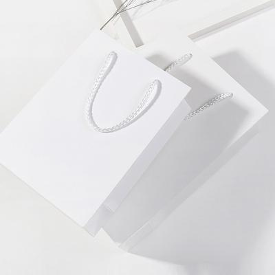 China Custom Print Cheapest Price Shopping Paper Bag Luxury Paper Gift Bag With Your Own Logo for sale
