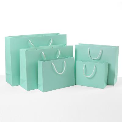 China Wholesale Luxury High-end Printed White Shopping Paper Bags With Your Own Logo for sale