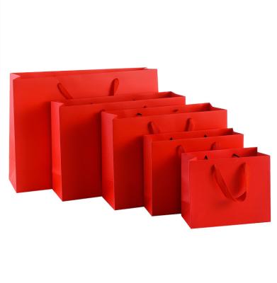 China Customize Design Kraft Fancy Shopping Paper Bag Printing Gift Custom Craft Item Hand Bag for sale
