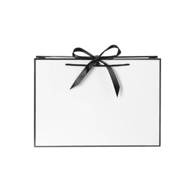 China Factory price china wholesale custom small luxury logo recycled paper kraft gift bags with handles for sale