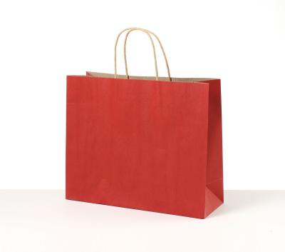 China Luxury Gift Kraft Paper Bags Pink Packaging Printed Custom Logo  For Clothing Shoes for sale