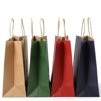 China Pink Logo White Kraft Paper Bags Mini Jewelry Gift Carrier Shopping For Clothes for sale