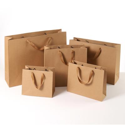 China Kraft Shopping Paper Gift Bags With Handles Printed Cosmetics Jewelry Packaging for sale