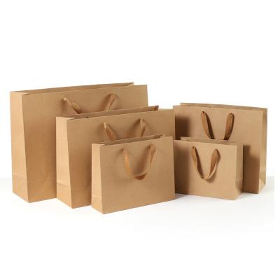 China Black White Brown Kraft Paper Bags Gift Custom Luxury Shopping Paper Packing for sale