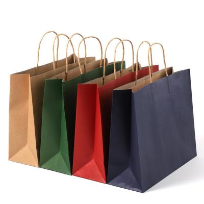 China Shopping Kraft Paper Bags Custom Printed Logo With Handle Clothing Shoes Packaging for sale