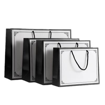 China Foil Hot Stamping Printed Paper Gift Bags , Small Medium Large Green Paper Bags With Logo for sale