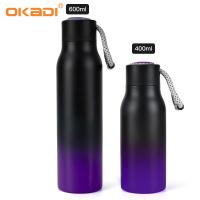 China 500ml 600ml Vacuum Sports Bottle Gradient Double Wall Insulated Thermos With Nylon Rope for sale