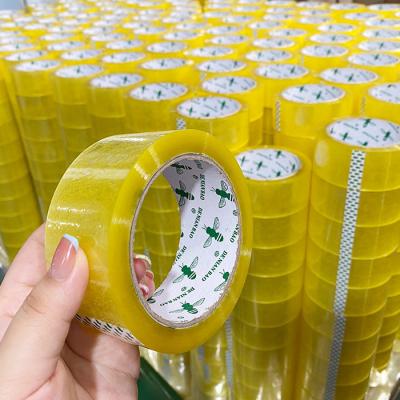 China Factory Customized BOPP Yellowish Yellow Packing Adhesive Sealing Tape for sale
