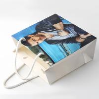 China Prevent Dust Kraft Paper Shopping Bag Customizable For Logo Or Brand Name for sale