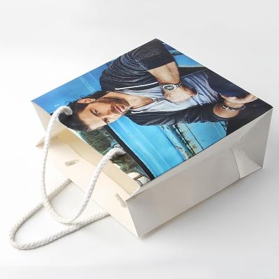 China Prevent Dust Kraft Paper Shopping Bag Customizable For Logo Or Brand Name for sale
