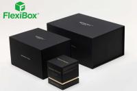 China Luxury Black & Gold Magnetic Flip-Top Perfume Gift Box with Customizable Inner Support for sale