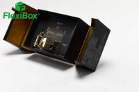 China Luxury Black & Gold Magnetic Flip-Top Perfume Gift Box with Customizable Inner Support for sale