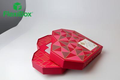 China Flat Heart-Shaped Chocolate Gift Box with Gold-Stamped Geometric Patterns and Customizable Compartmentalized Interior for sale