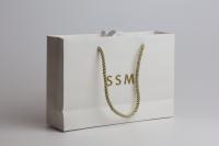 China Premium White Textured Specialty Paper Tote Bag with Gold Hot Stamped Lettering and Twisted Rope Handles for sale