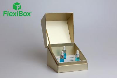 China Gold-Toned Finish Cosmetic Packaging Box with Silver-Foiled Brand Names and Lid-and-Base Design for Premium Anti-Aging Skincare Gift Box for sale