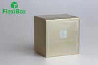 China Gold-Toned Finish Cosmetic Packaging Box with Silver-Foiled Brand Names and Lid-and-Base Design for Premium Anti-Aging Skincare Gift Box for sale