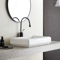 China Modern Premium White Ceramic Sanitaryware Countertop Sinks Simple Irregular Art Basin for Hotel Dining Room Hand Wash for sale