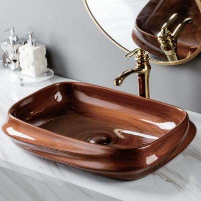 China Golden Plated Luxury Ceramic Sanitary Ware Modern Table Counter Top Washbasin Gold-Faced Hand Wash Basin for Bathroom Sink for sale