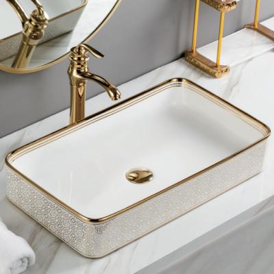 China Luxurious Embossed Golden/Silver Europe Vintage Style Ceramic Washing Basin Counter Top Painted Ceramic Bathroom Sinks for sale