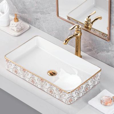 China Above Counter Mounted Luxury Electroplate WC Sanitary Ware Oval Porcelain Handmade Wash Basin Bathroom Ceramic Table Top Sink for sale