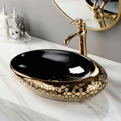 China Oval Shape Electroplate Luxury Art Basin Ceramic Lavabo Hand Wash Basin Counter top Bathroom Vessel Sink for sale