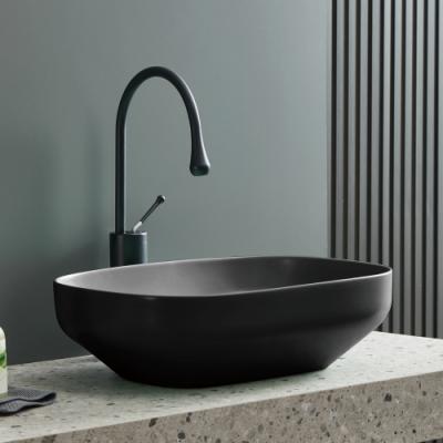 China Italian Art Basin Modern Minimalist Designer Wash Basin Big Size Oval Bathroom Sinks With Drainer New Arrival for sale