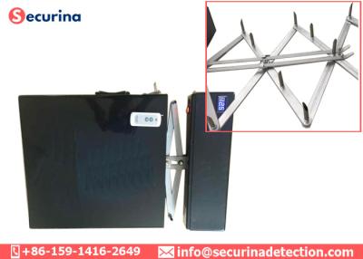 China 20 Ton Load Traffic Spike Barrier Portable Handheld Retractable Road Blocker for sale