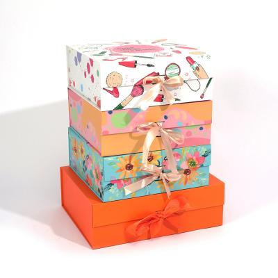 China Packaging Matte Black Custom Logo Luxury Foldable Magnetic Closure Gift Boxes With Ribbon for sale